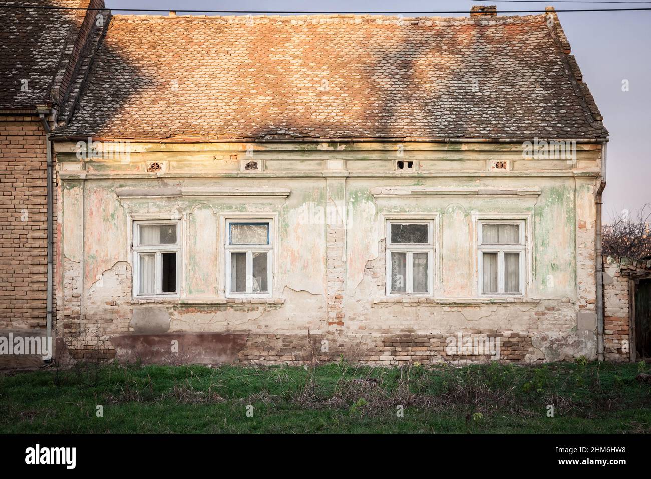 Picture of an abandoned farm in Vojvodina, in Serbia, with the facade ...