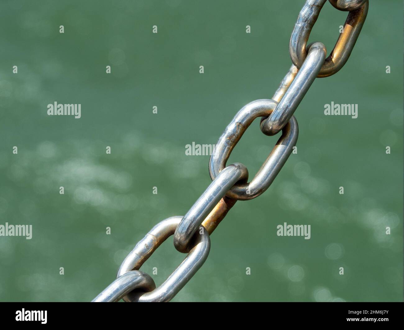 Safety first. Thick silver grey metal steel chain links. Linked ...