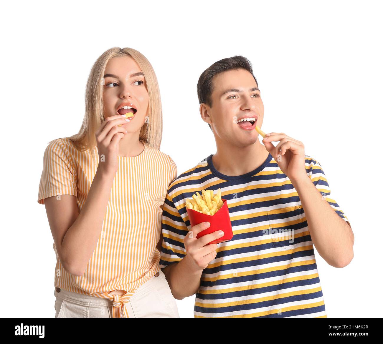 Fat woman eating fries Cut Out Stock Images & Pictures - Alamy