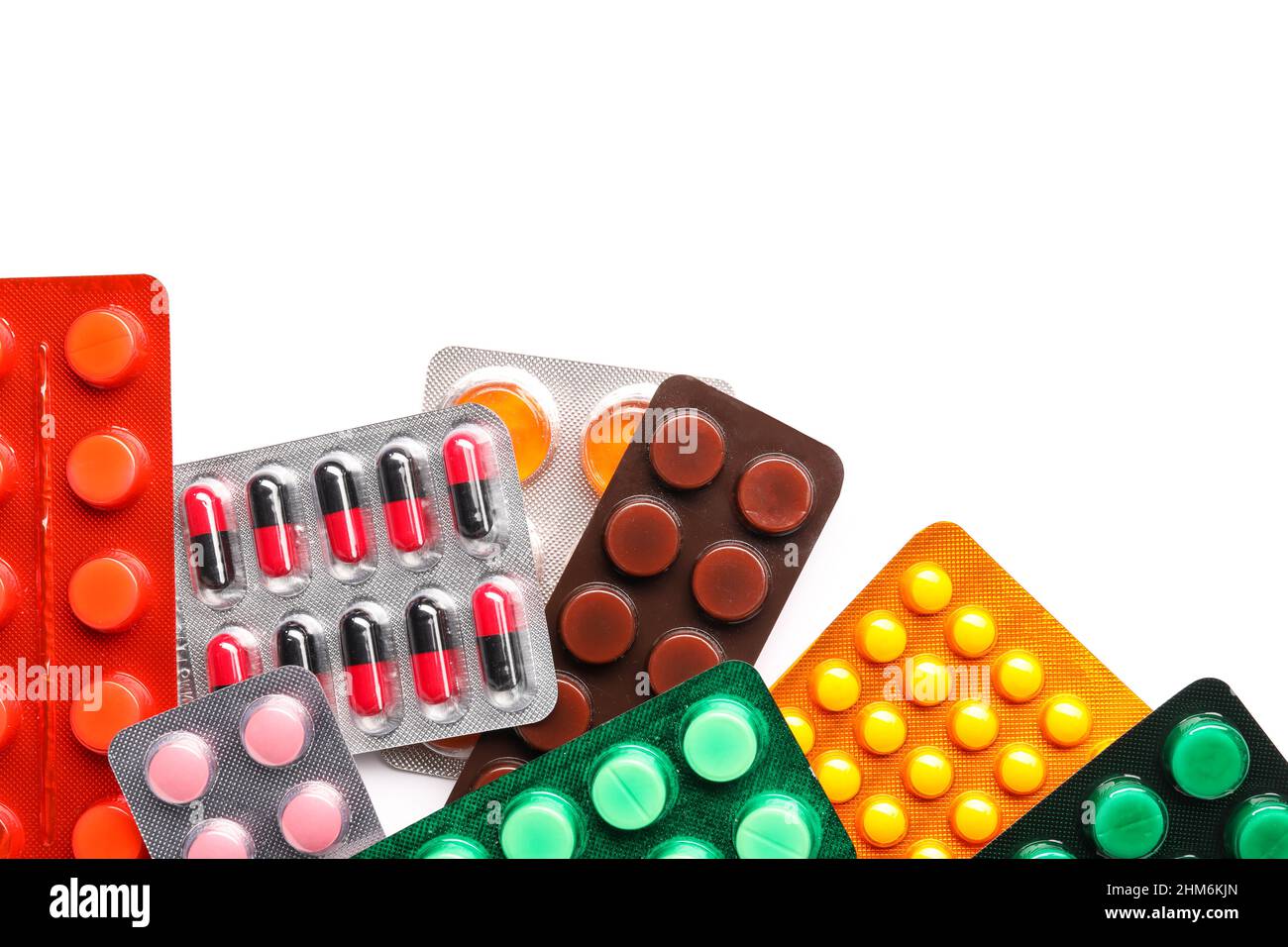 Different blister packs with pills on white background, closeup Stock ...