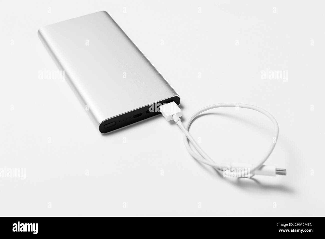 Modern power bank isolated on white background, closeup Stock Photo - Alamy