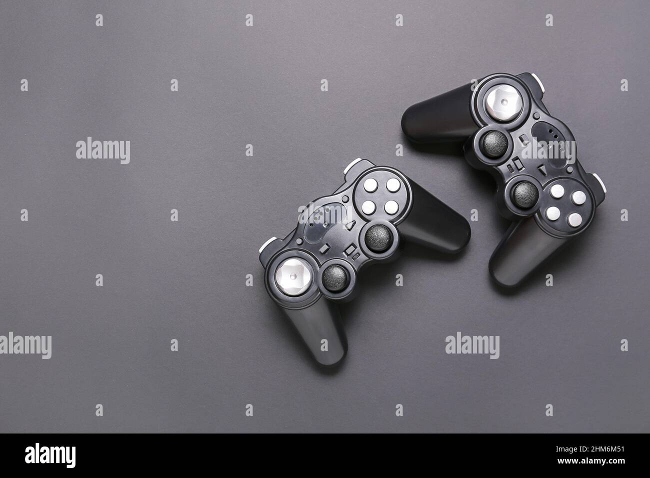 Modern joysticks on dark background Stock Photo - Alamy