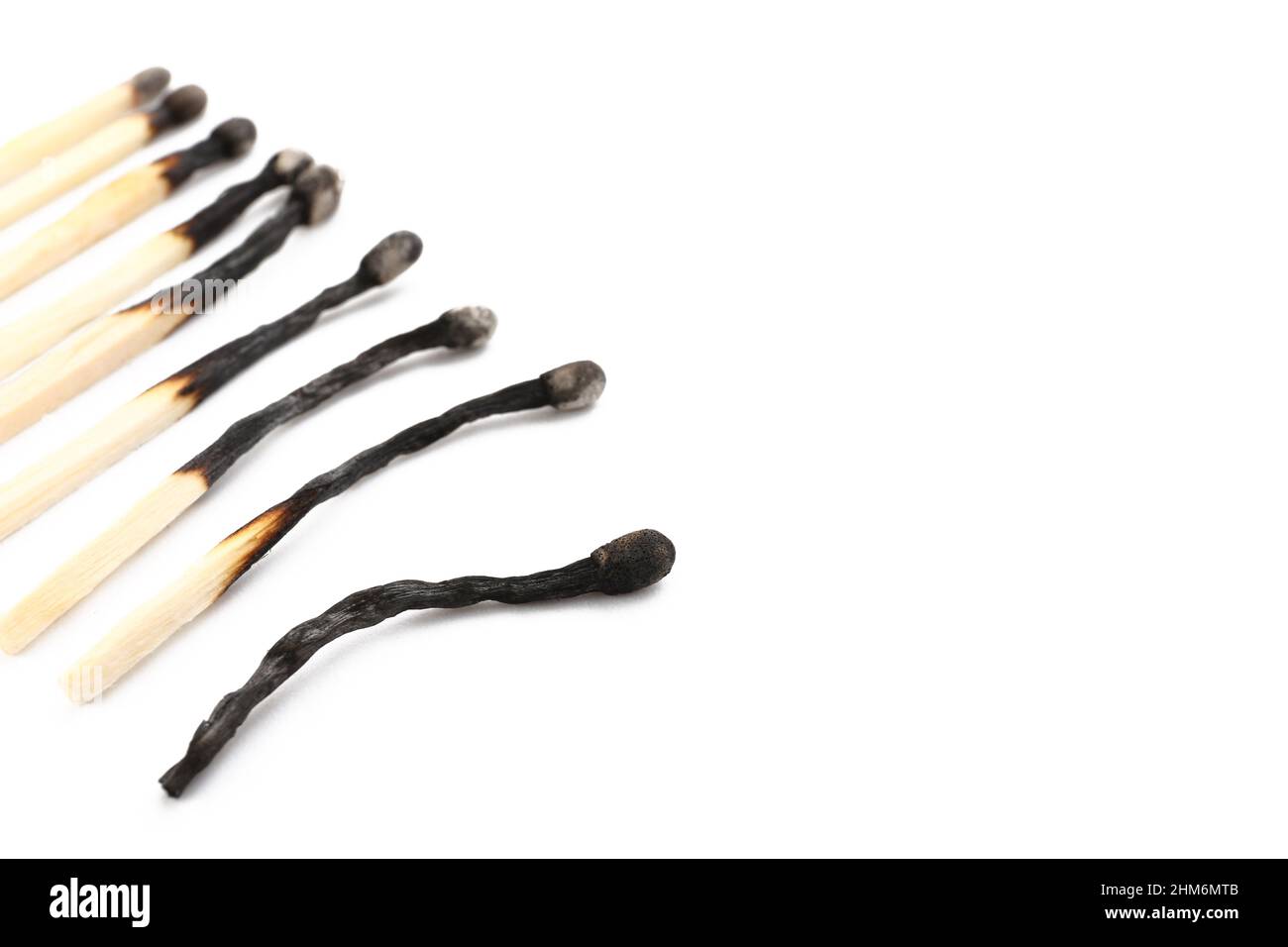 Row of matches on white background, closeup. Concept of different human ...