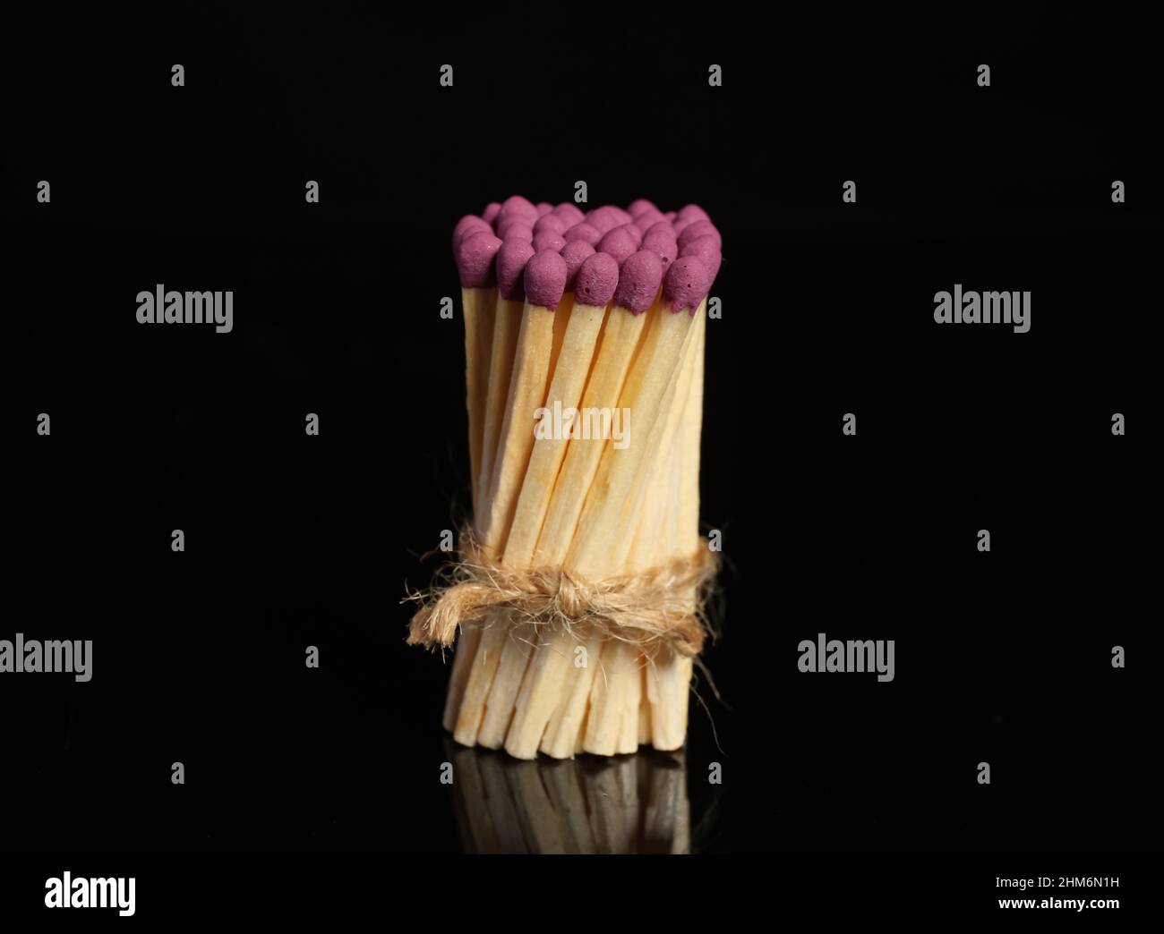 Bunch of matches on black background. Concept of unity Stock Photo - Alamy
