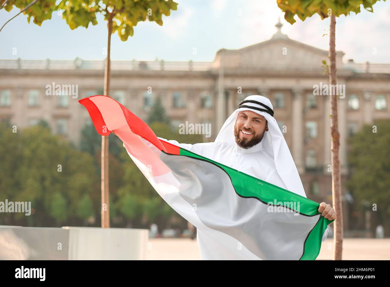 Young arabic man smiling outdoors hi-res stock photography and images ...