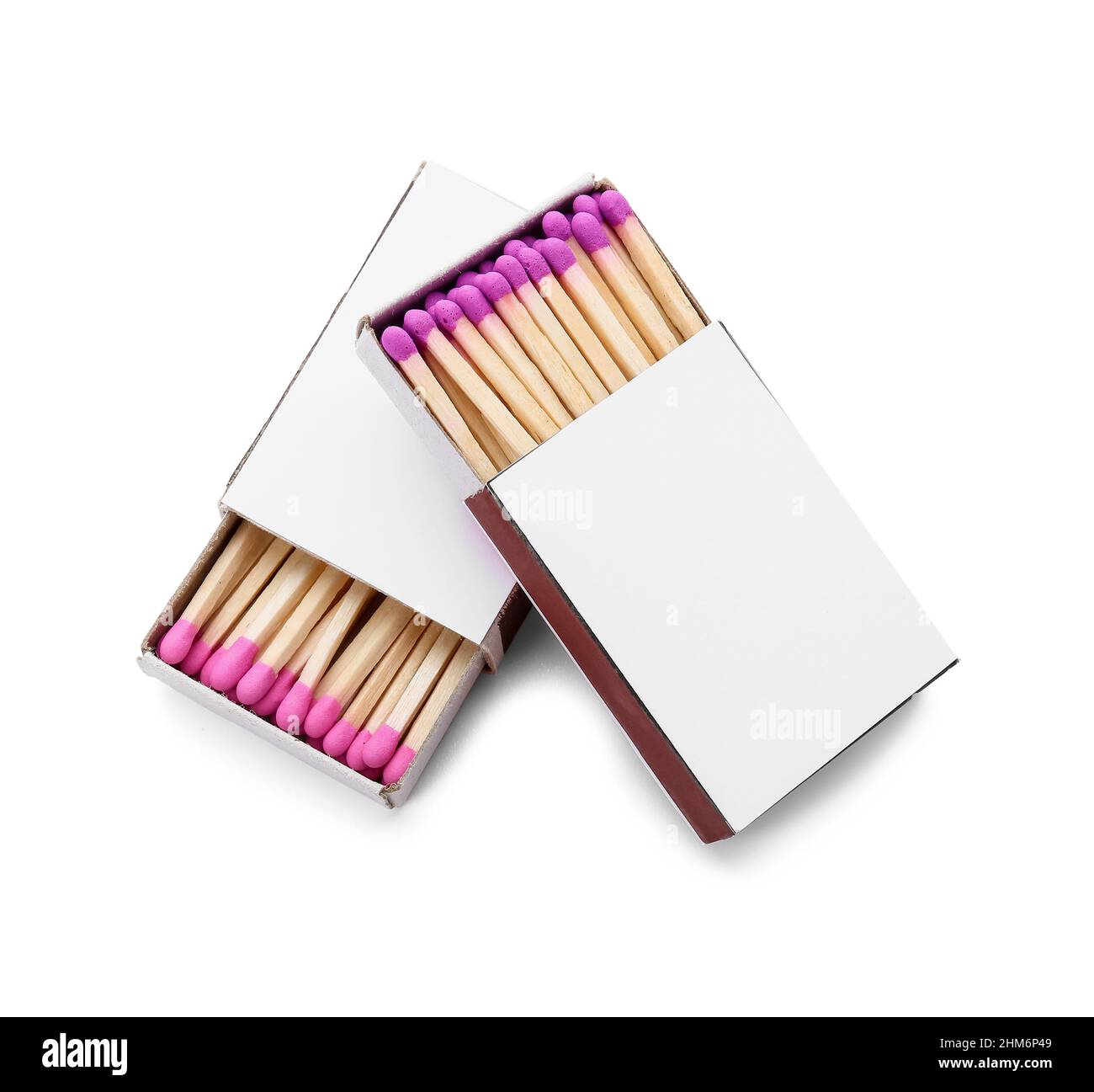 Boxes with new matchsticks on white background Stock Photo - Alamy