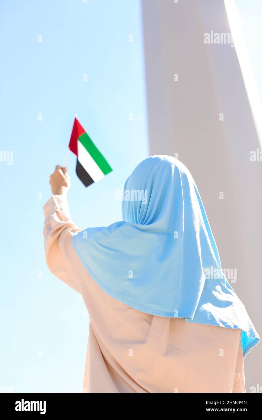 Beautiful Muslim woman with UAE flag outdoors Stock Photo - Alamy