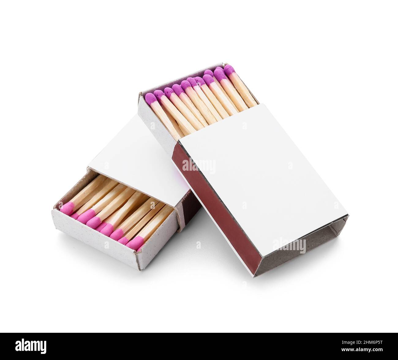 Boxes with new matchsticks on white background Stock Photo - Alamy