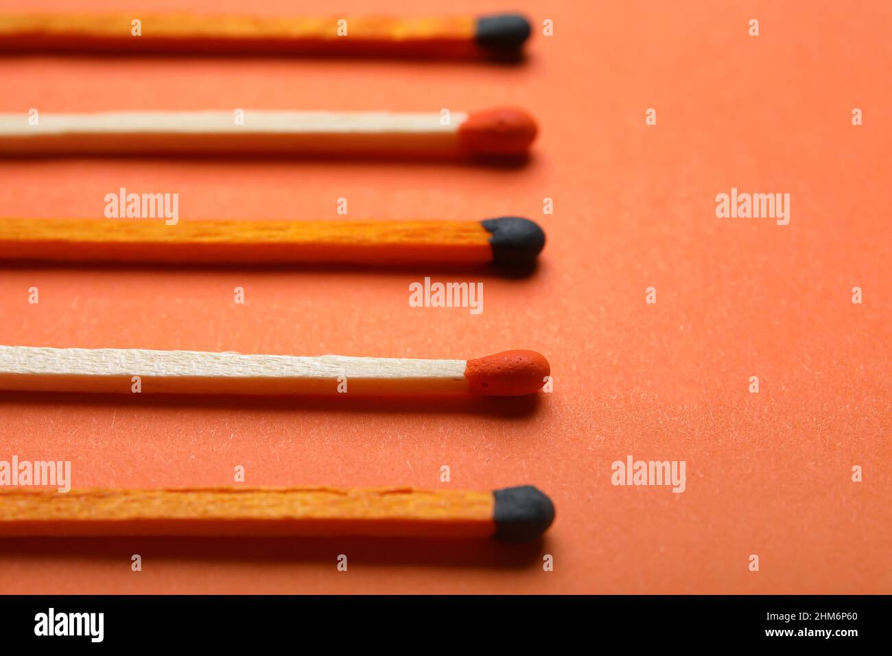 Different new matchsticks on orange background, closeup Stock Photo - Alamy