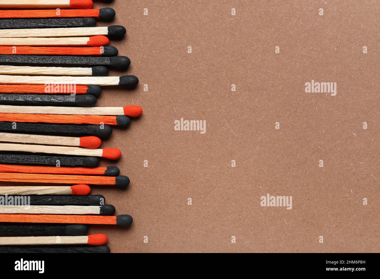 Different new matchsticks on brown background, closeup Stock Photo - Alamy