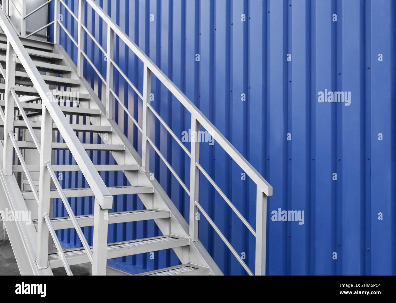 Modern metal stairs of blue building outdoors Stock Photo - Alamy