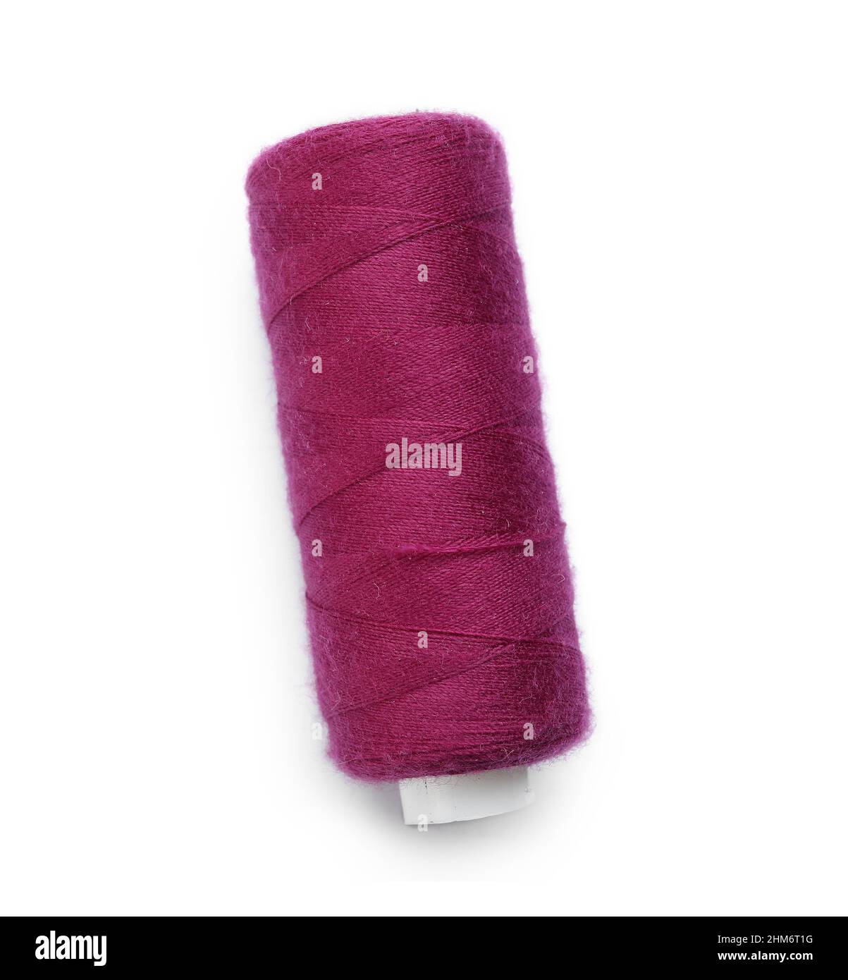 Beautiful sewing thread spool on white background Stock Photo - Alamy