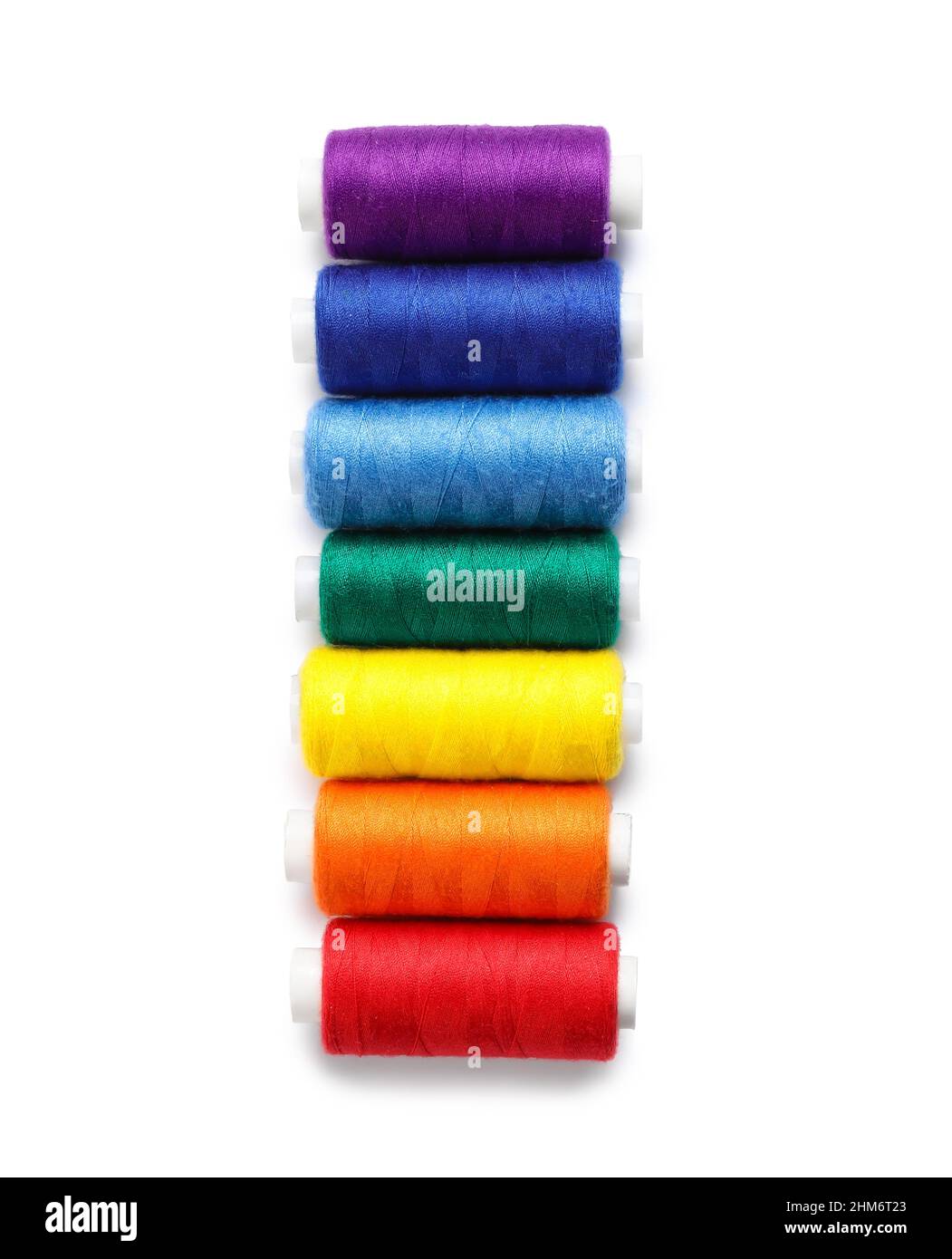 Beautiful sewing threads on white background Stock Photo - Alamy