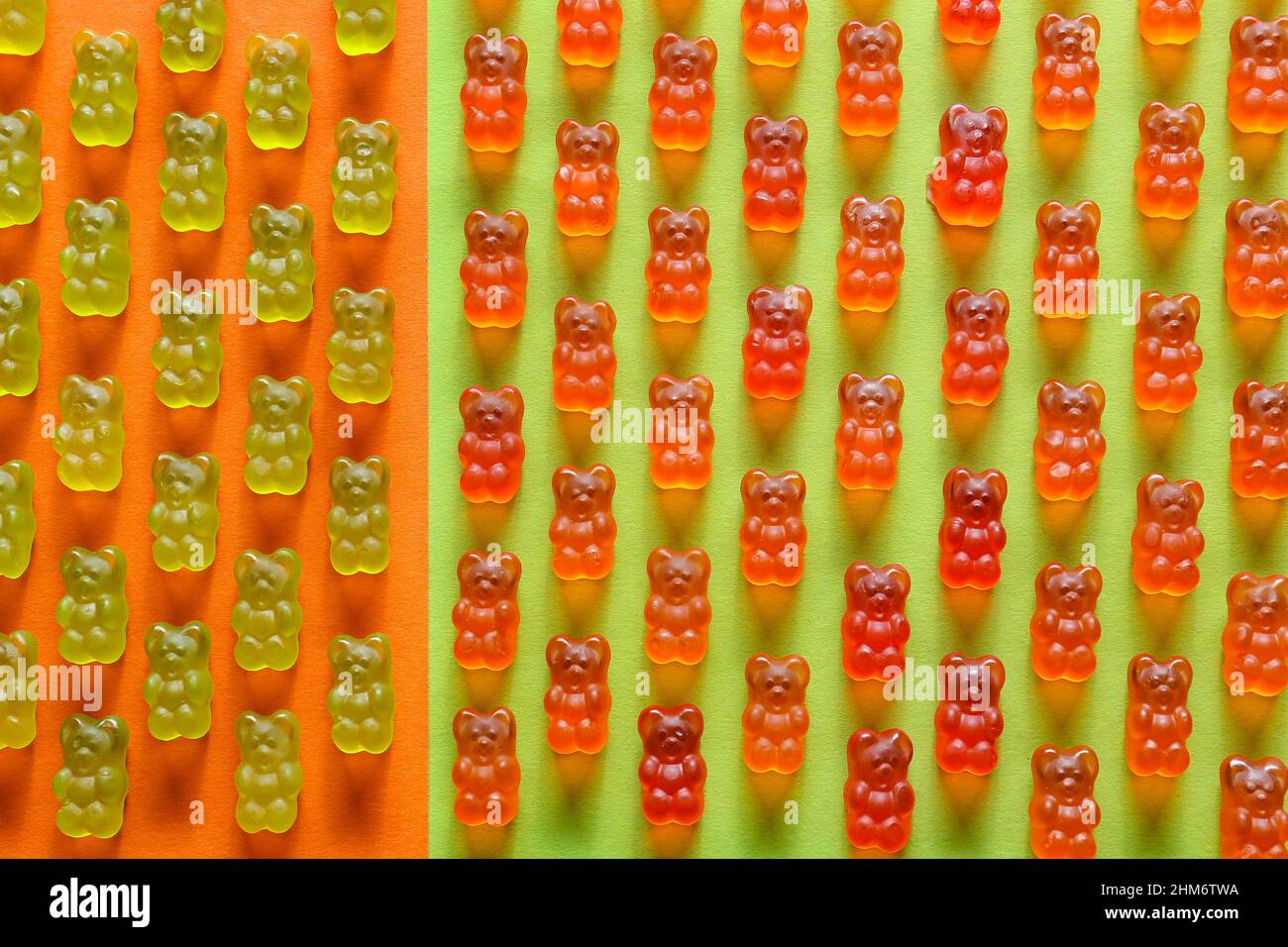 Yummy jelly bears on color background Stock Photo - Alamy