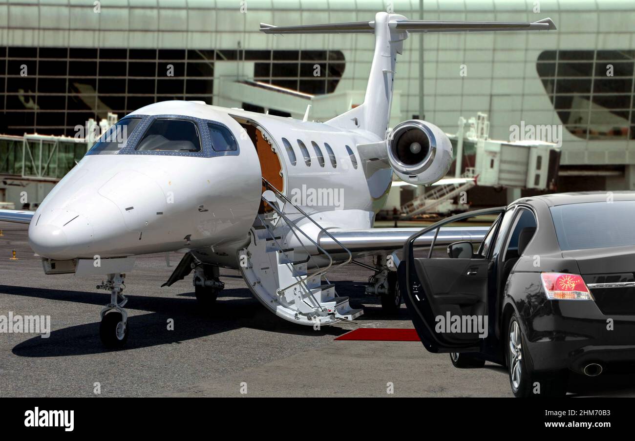 Private jet waiting for passenger with black limo in airport Stock ...
