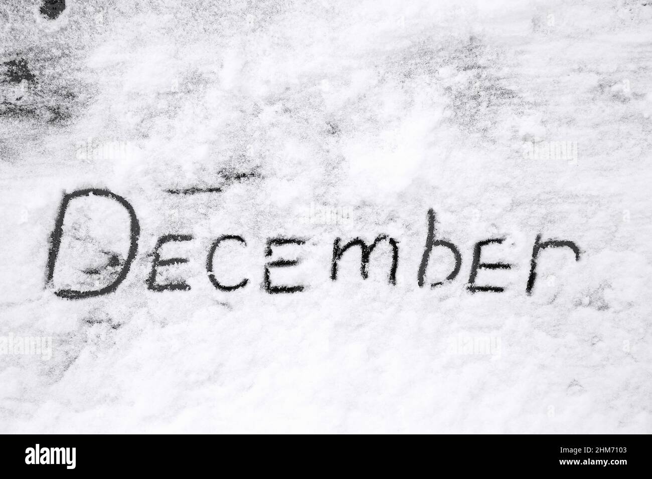 Word DECEMBER written on car covered with snow Stock Photo - Alamy