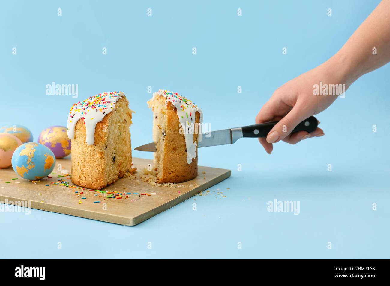 Young woman cutting homemade cake hi-res stock photography and images ...