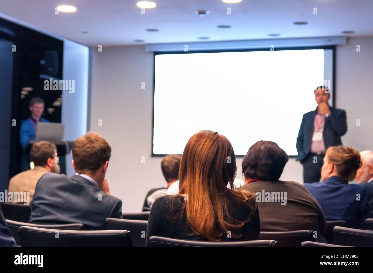 people sitting back at the business conference Stock Photo - Alamy