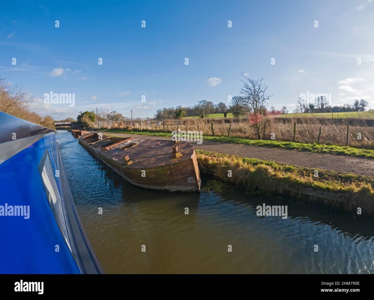 View from narrowboat with barge shipwreck moored up in English rural ...