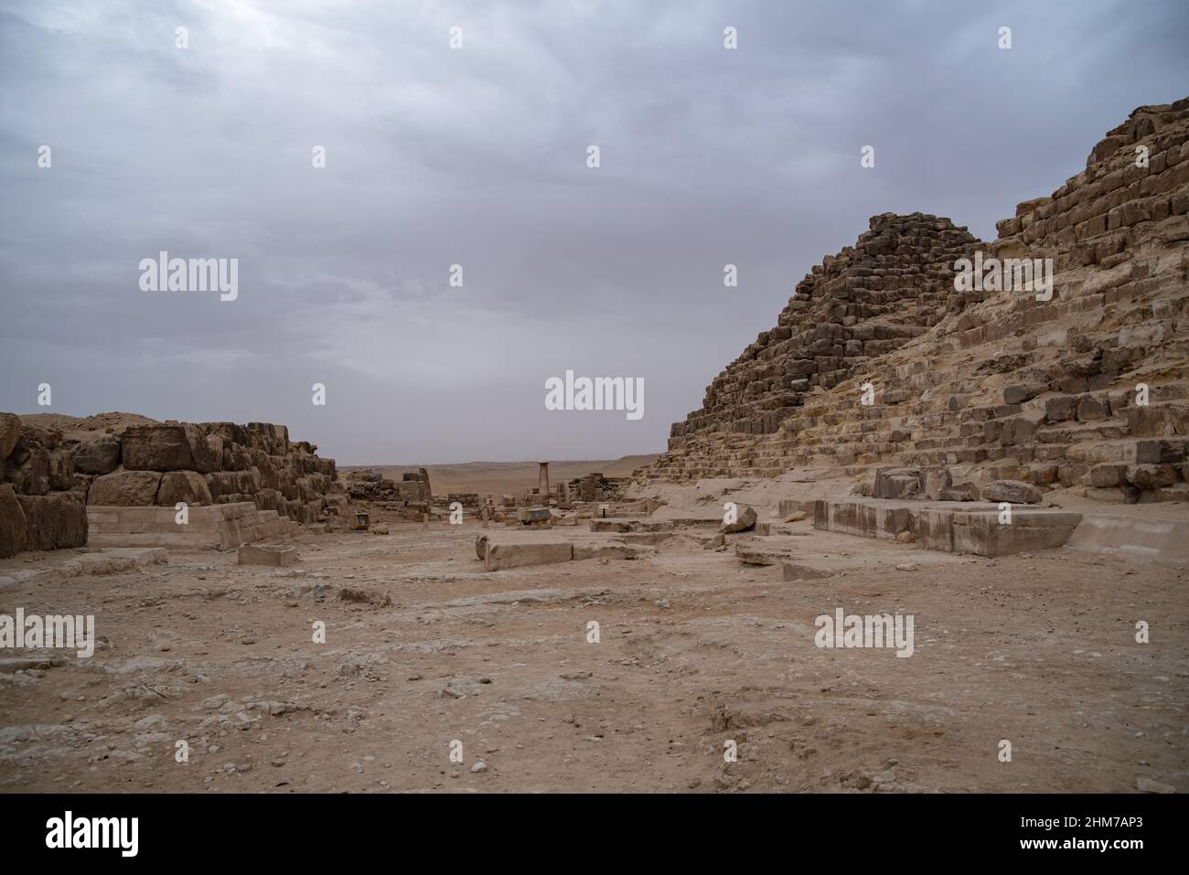 Ruins of the small pyramid of Queen Henutsen near Cheops Pyramid. Giza ...
