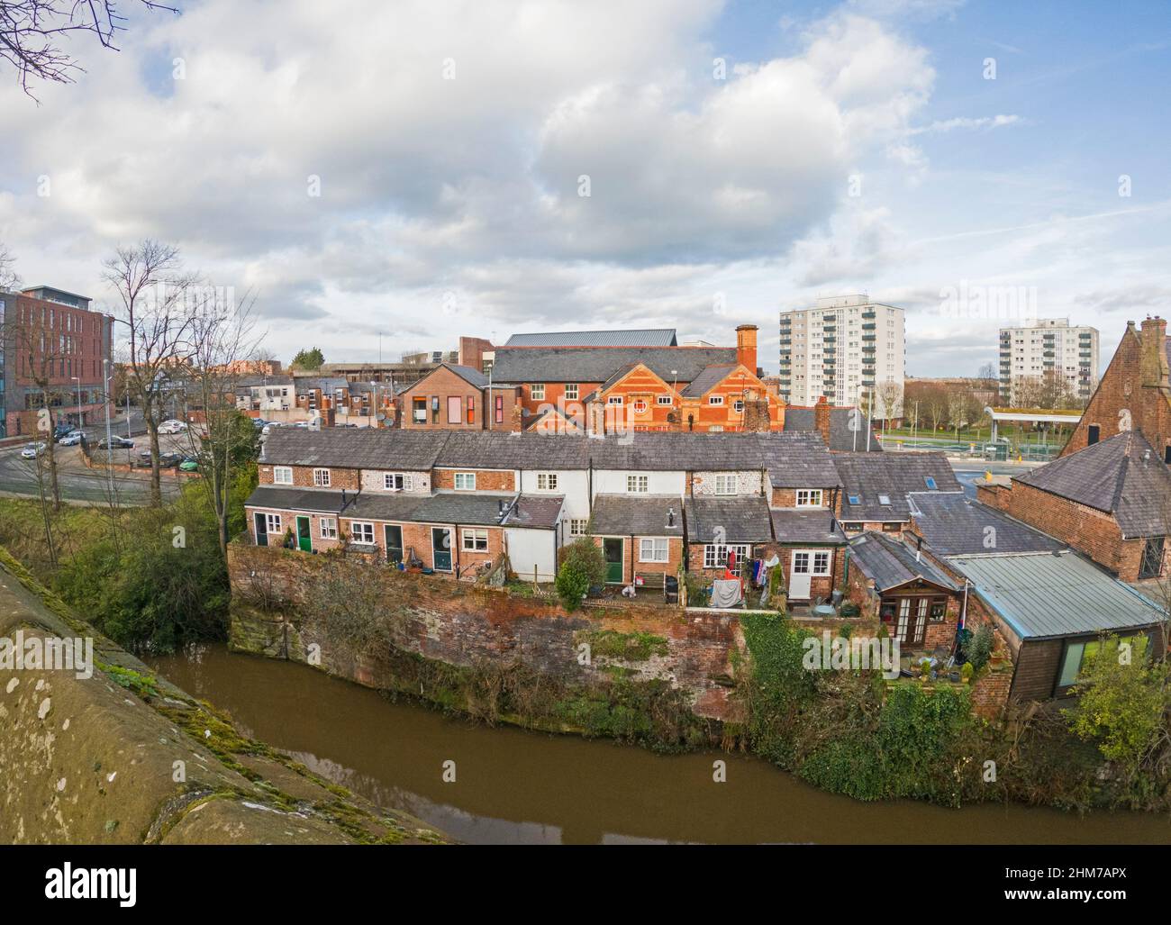 View from narrowboat traveling through English urban scenery on British ...