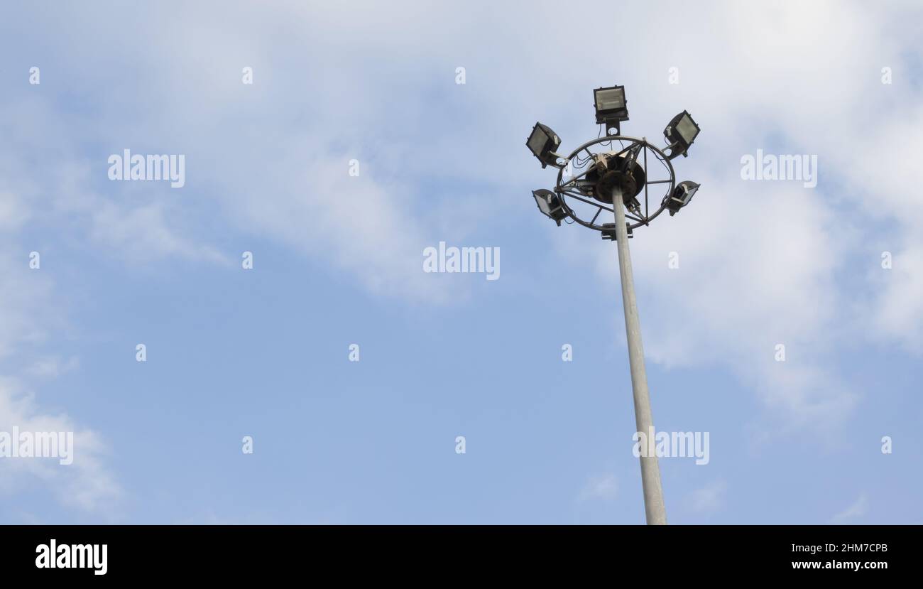 Light pole with blue sky and cloud in city. Spotlight tower. for the ...