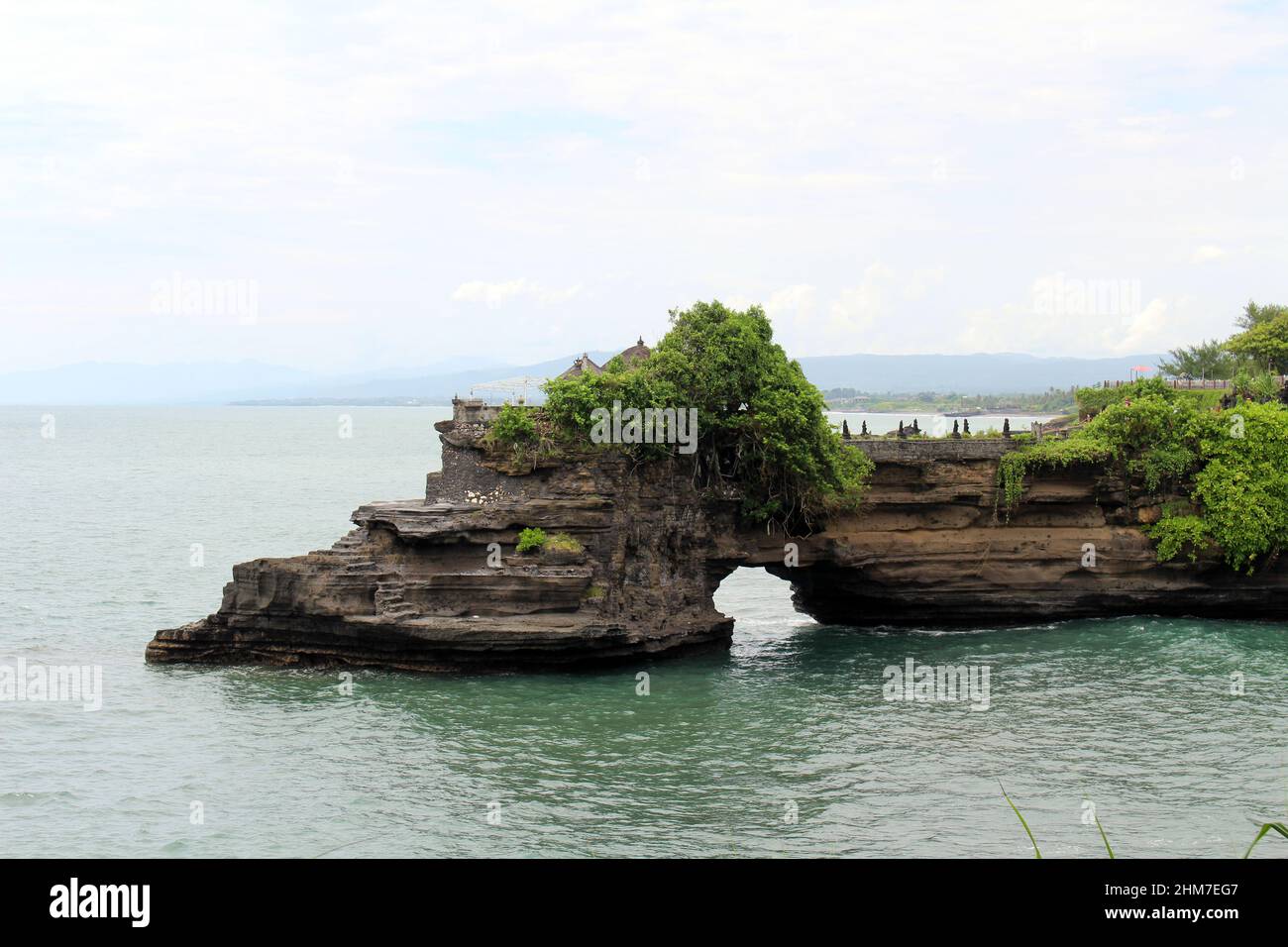 Pura Batu Bolong and hole of rock formation around Tanah Lot Temple ...