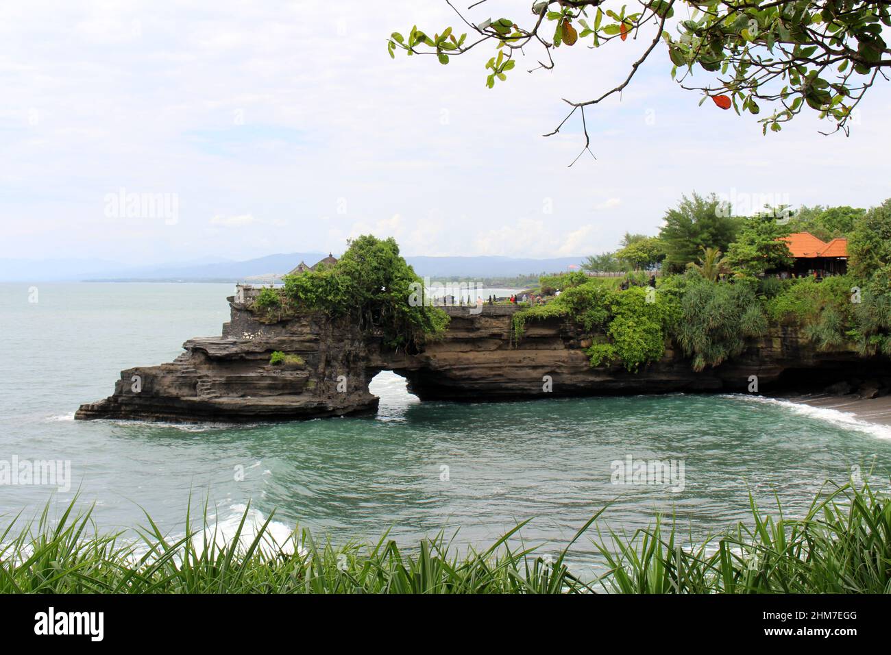Pura Batu Bolong and hole of rock formation around Tanah Lot Temple ...