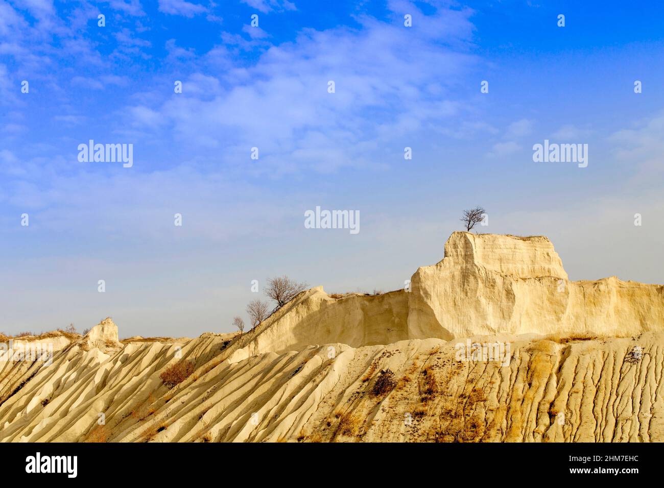 A sandy hill against blue sky in beautiful wilderness Stock Photo - Alamy
