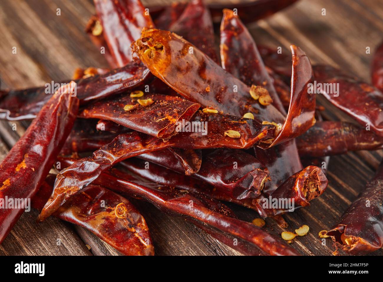 Dried red hot pepper on wooden vintage background. Close up Stock Photo ...