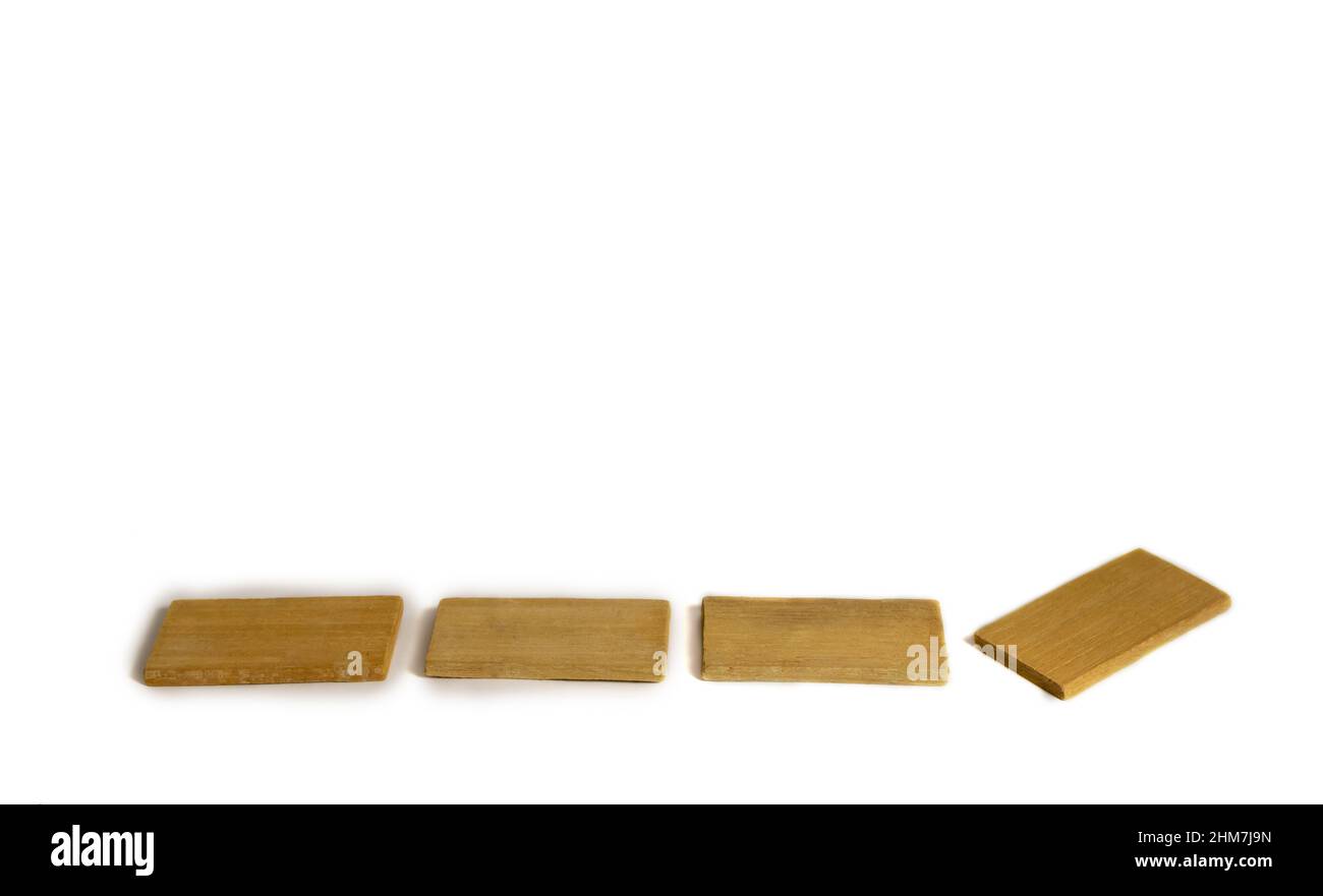 Row of four blank wooden blocks on a white background with copyspace ...
