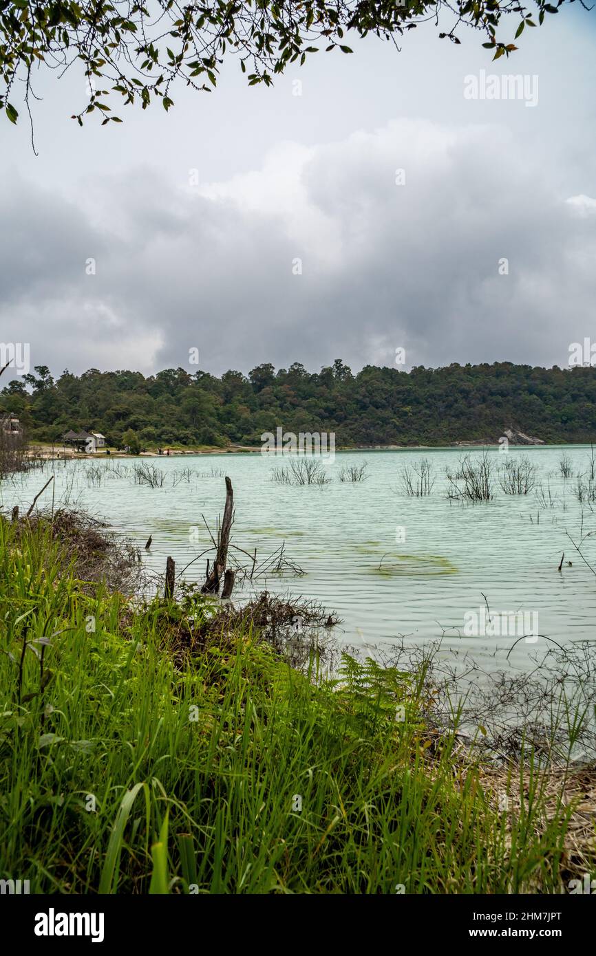 The view of the Blue Lake and the naturally green Mountains Stock Photo ...