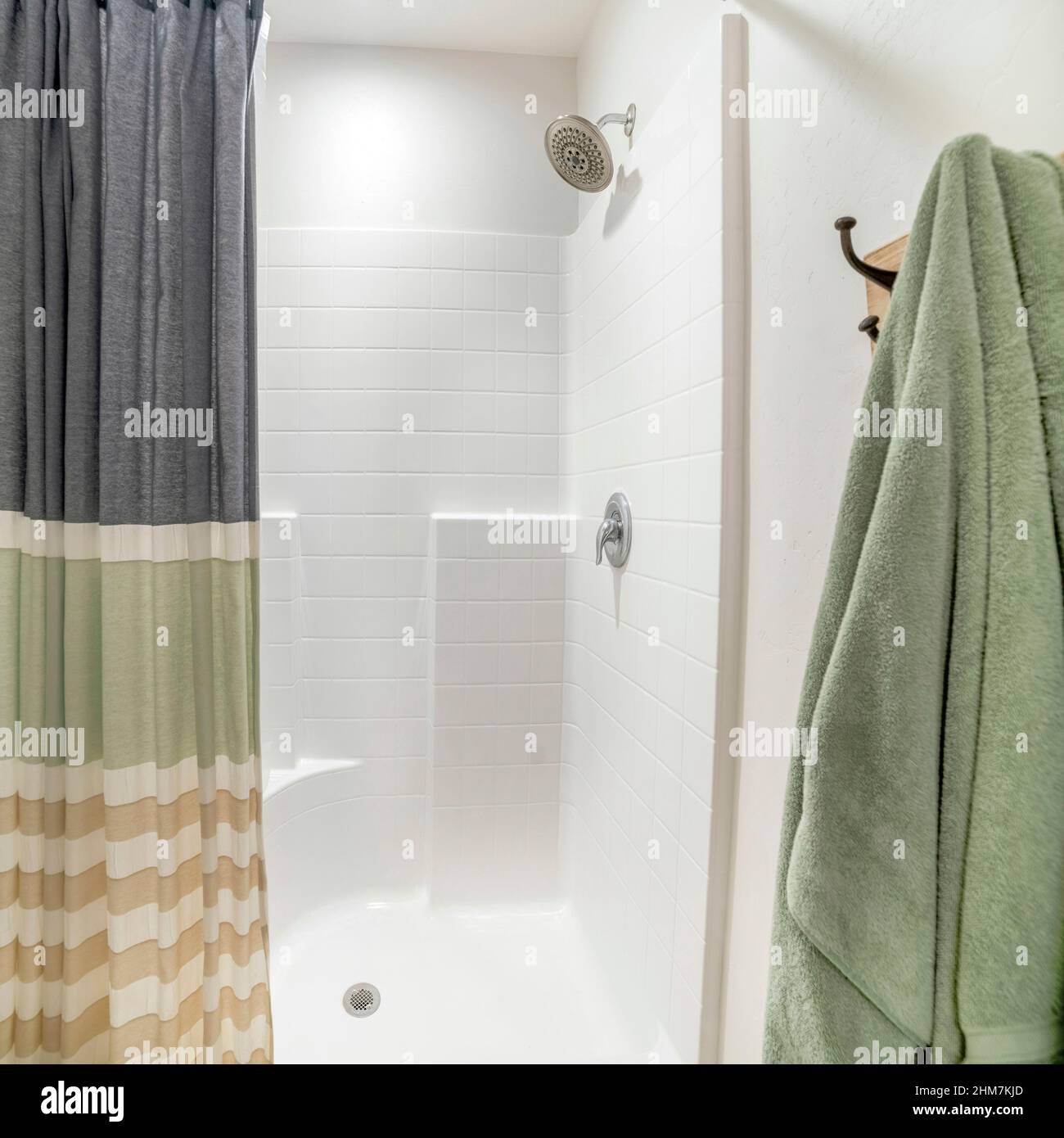 Square Shower stall of a bathroom with a tile pattern wall panel Stock ...