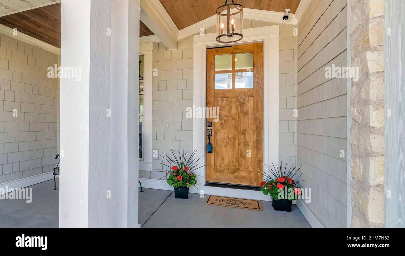 Panorama Front porch exterior of a house with decorated concrete block ...