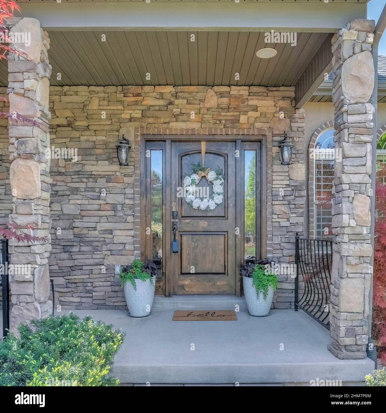 Square House exterior with a beautiful front garden entrance Stock ...