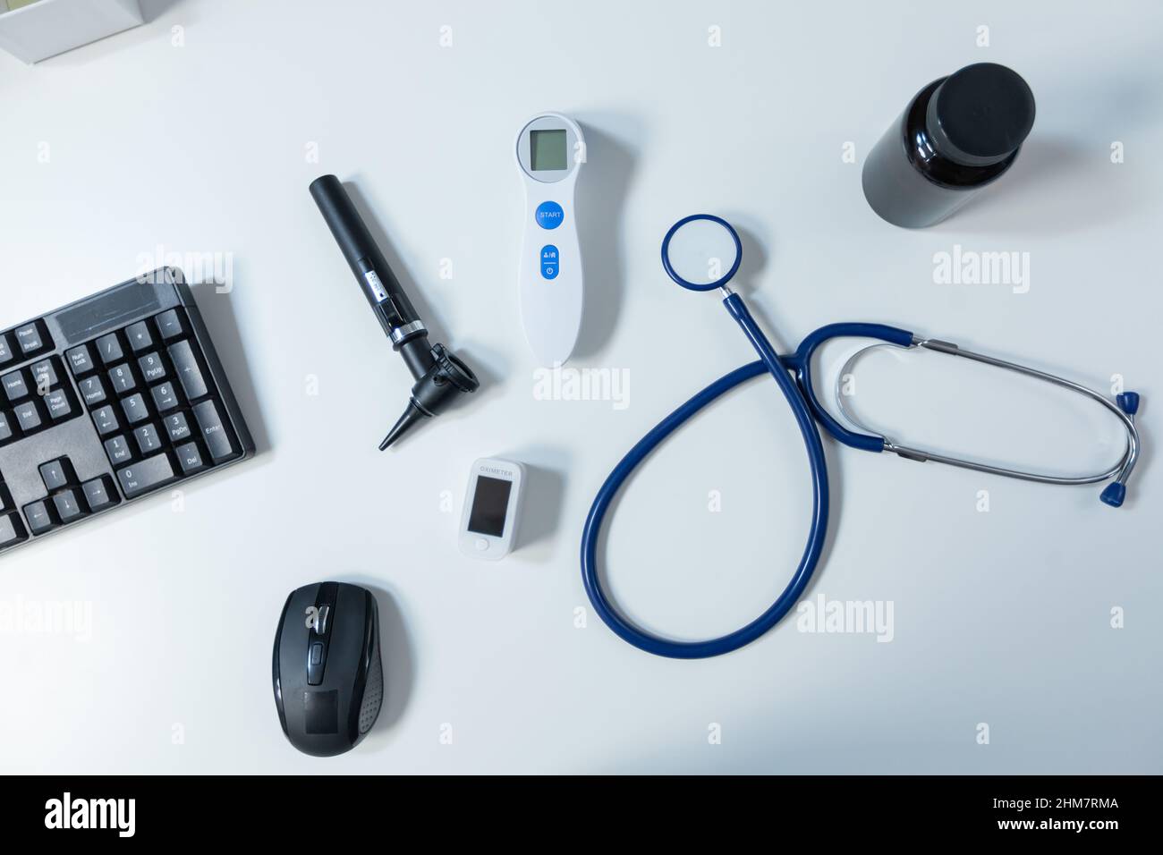 Top view of medical professional instruments standing on table in empty ...
