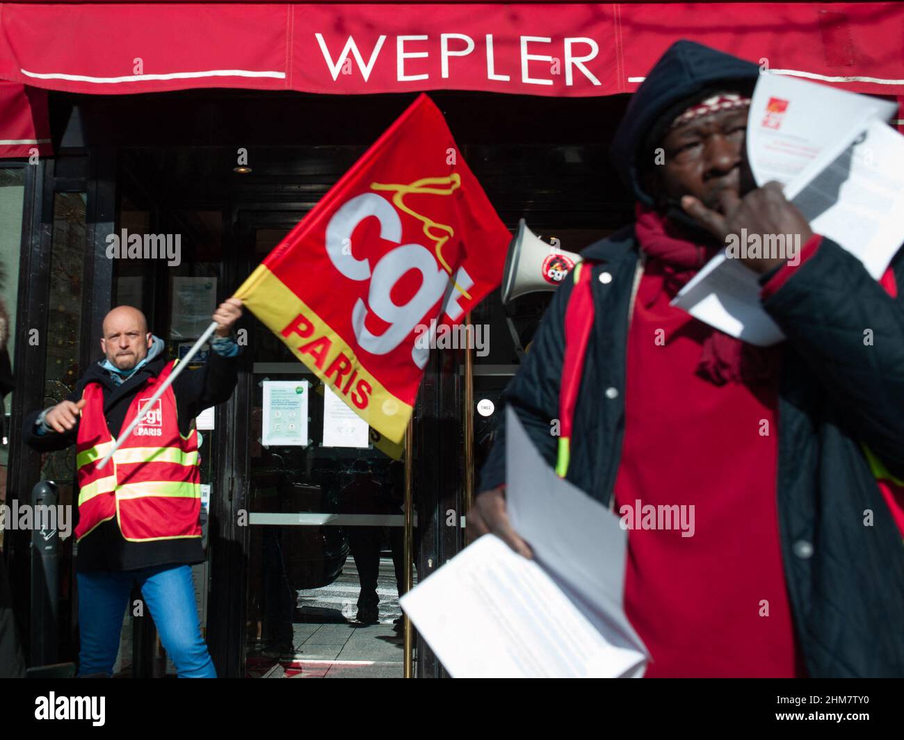 On-strike employees gather outside of the famous Wepler restaurant on ...