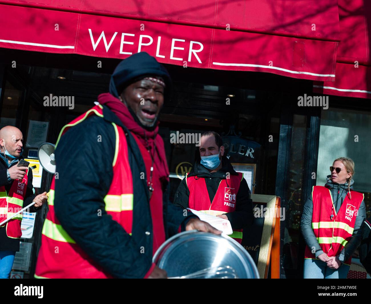 On-strike employees gather outside of the famous Wepler restaurant on ...