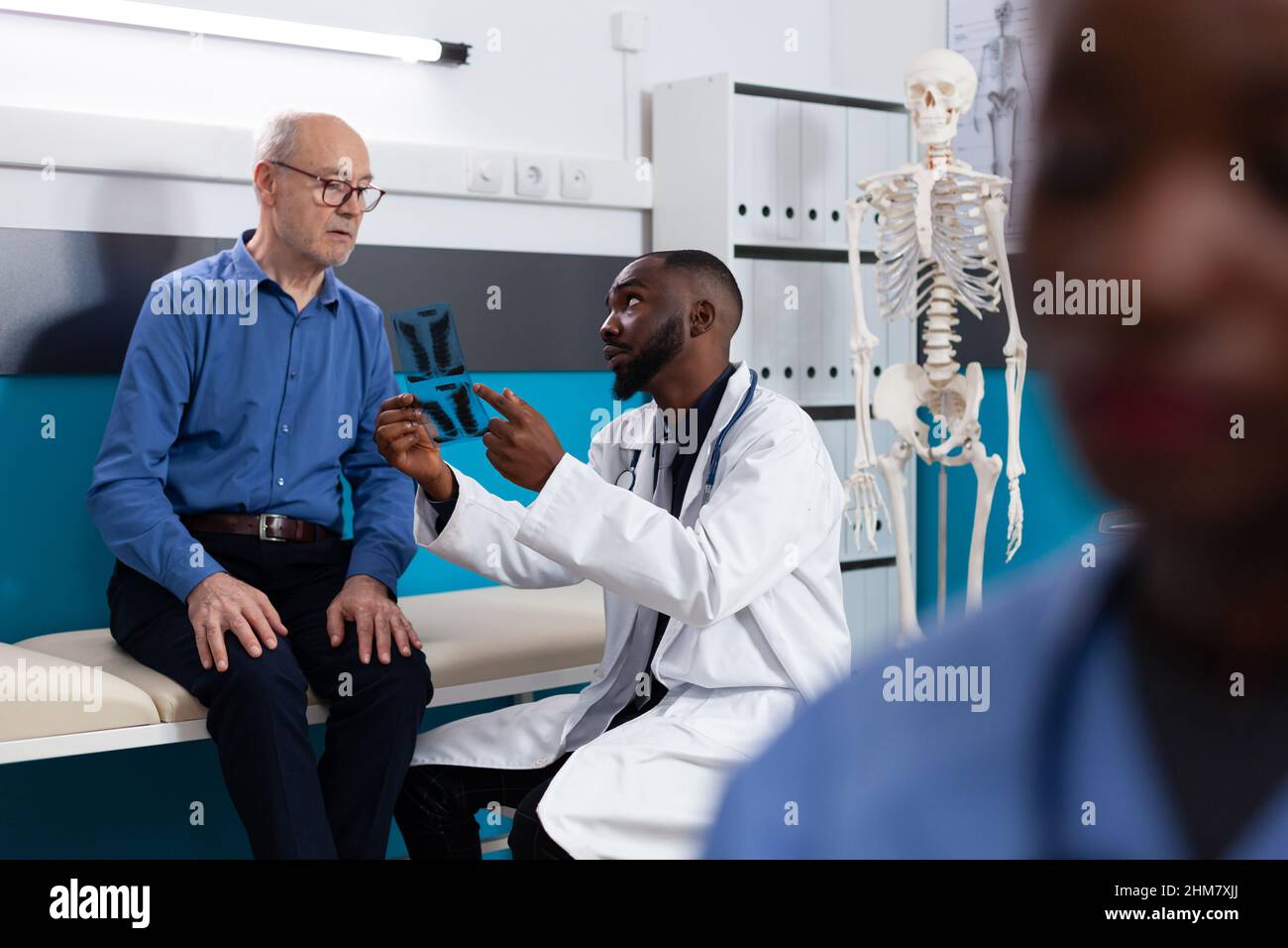 Specialist physician doctor holding lungs radiography discussing ...