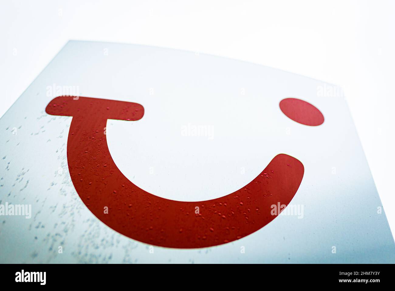 Hanover, Germany. 08th Feb, 2022. A Tui AG logo is seen on a sign outside a building at the ...