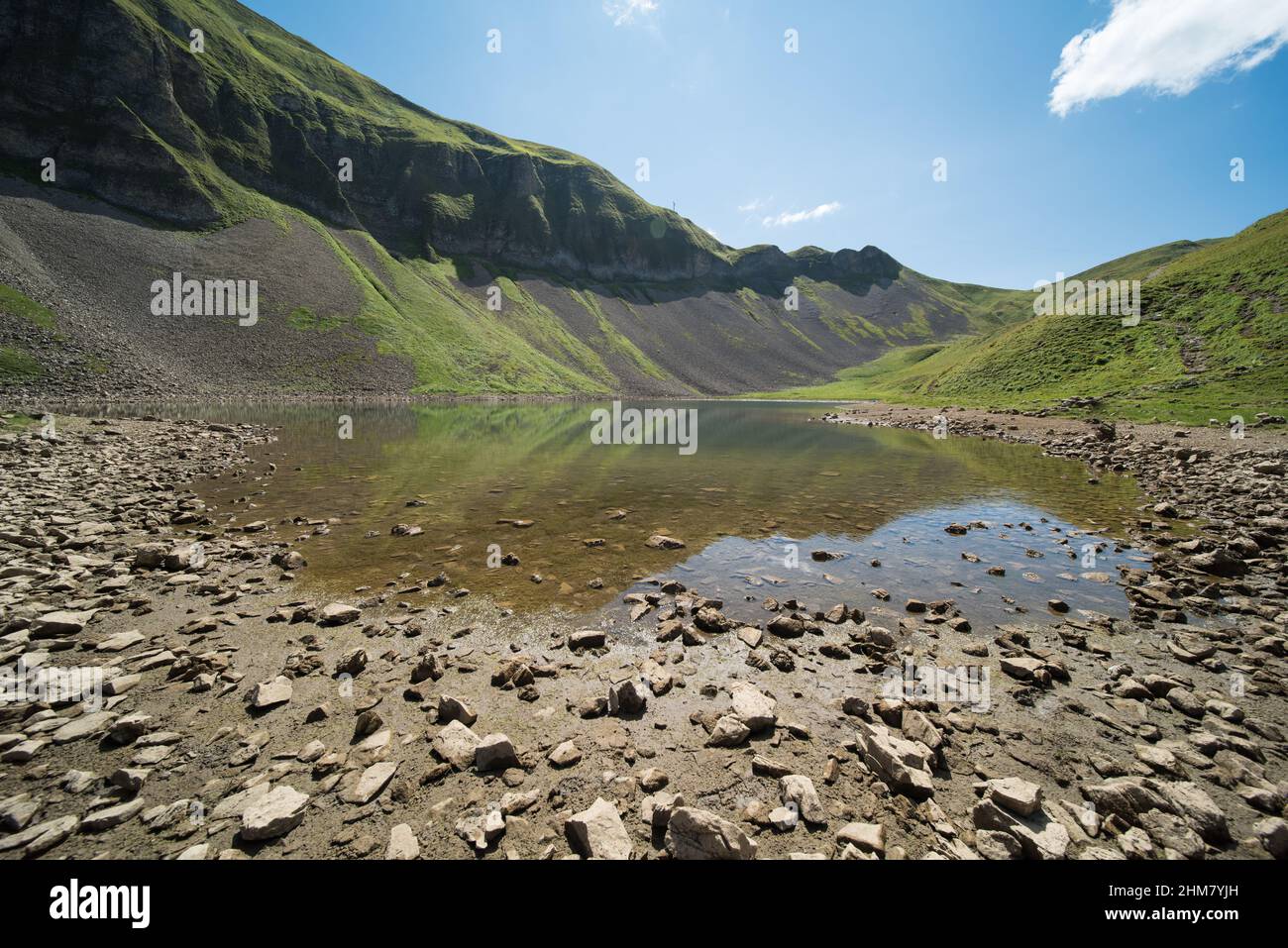 landscape in switzerland at the eisee 1900m. The lake is of natural ...