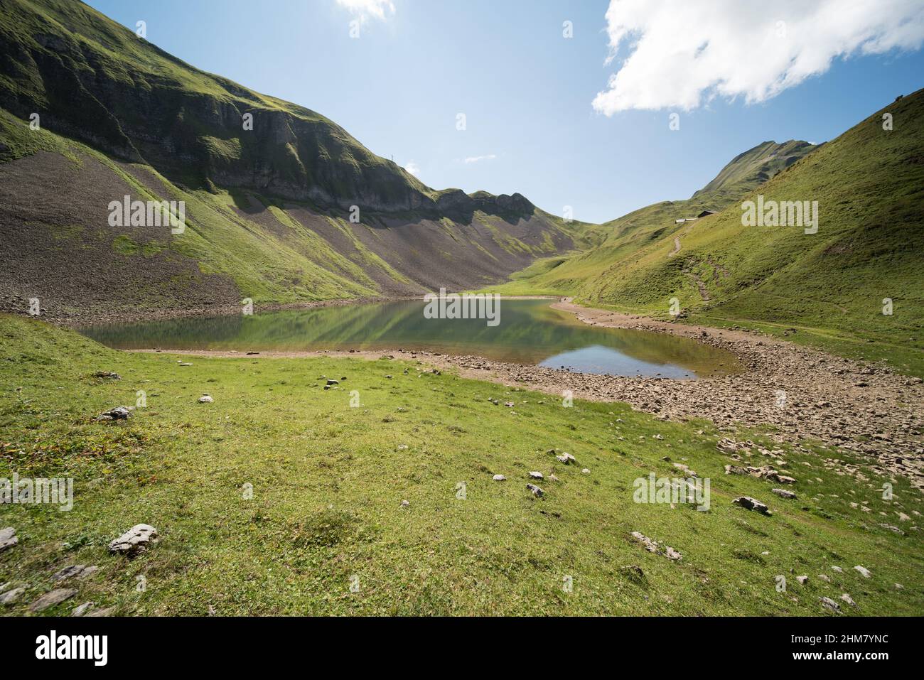 landscape in switzerland at the eisee 1900m. The lake is of natural ...
