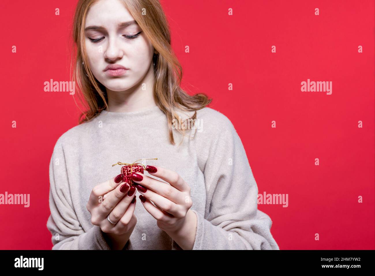 Disgusting gift. Exchange of gifts. Disappointment. Christmas. New year ...