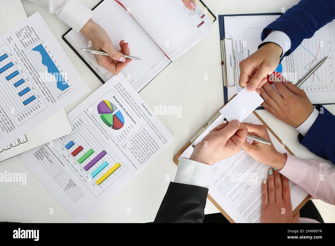 Team work on project together, mess with papers on workplace, social ...