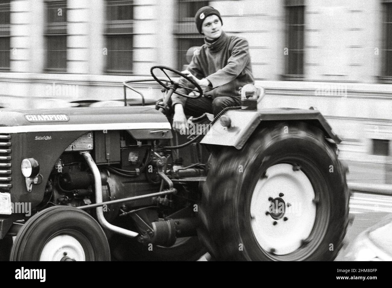 Old champion tractor in the city in grayscale Stock Photo - Alamy