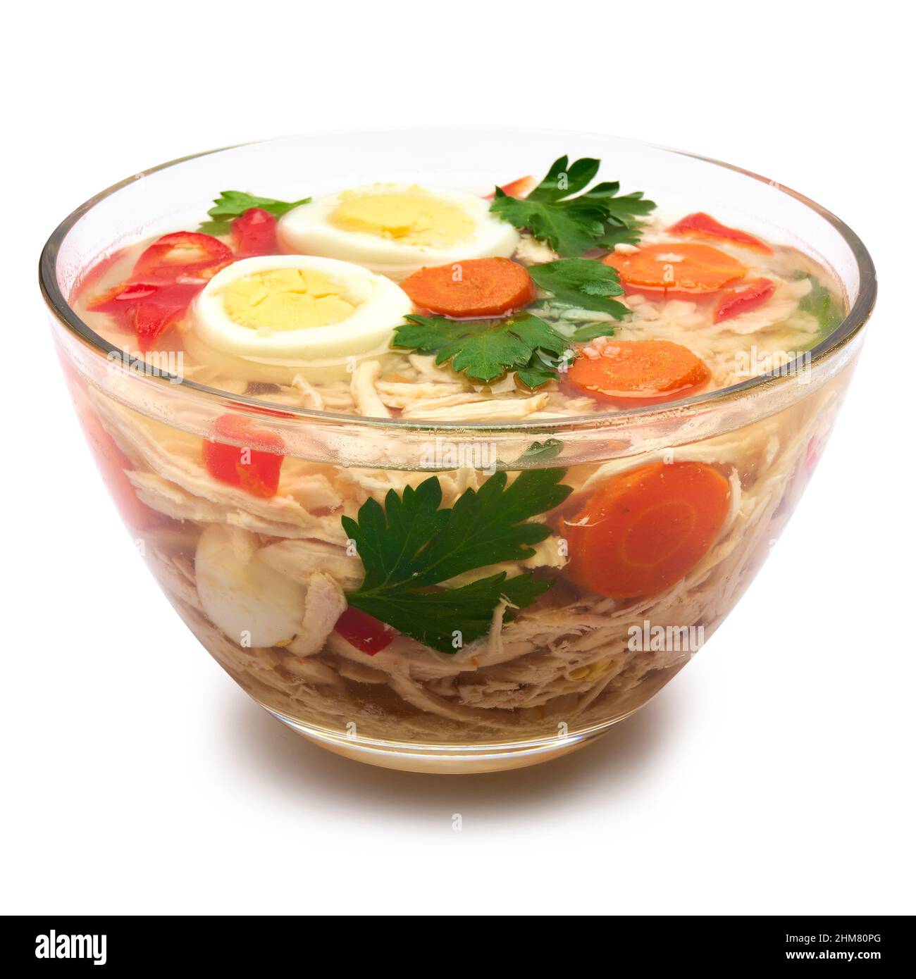 Delicious chicken aspic in glass bowl isolated on white background ...