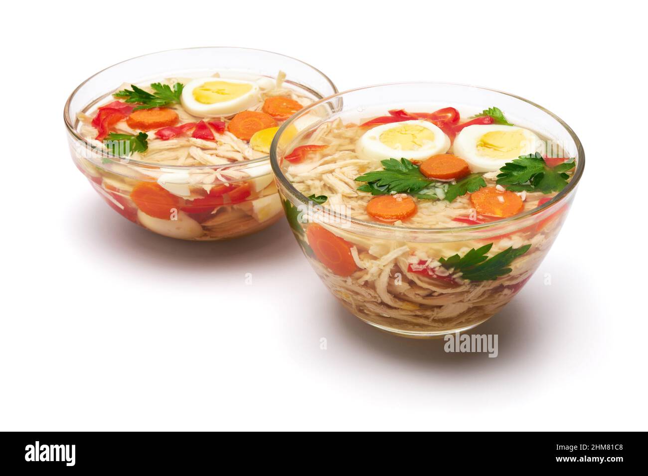 Delicious chicken aspic in glass bowl isolated on white background ...
