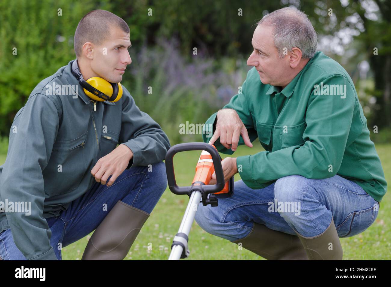 Happy male female gardeners hi-res stock photography and images - Alamy