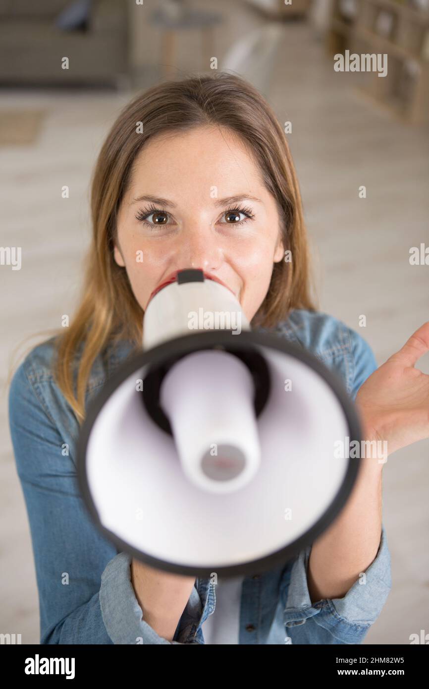 beautiful woman shouting with megaphone Stock Photo - Alamy