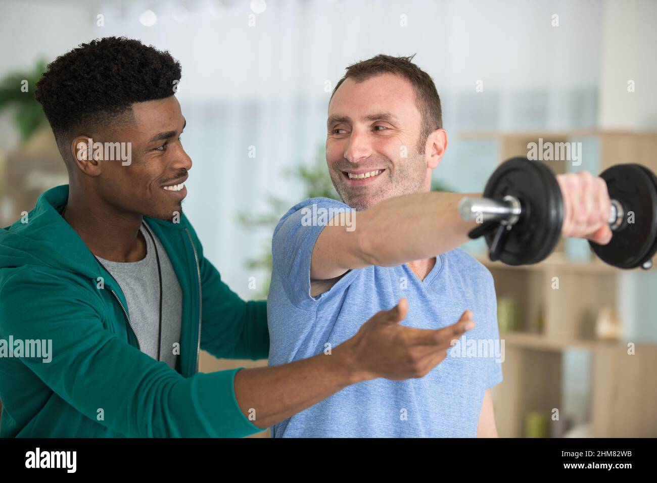 Receiving help hi-res stock photography and images - Alamy